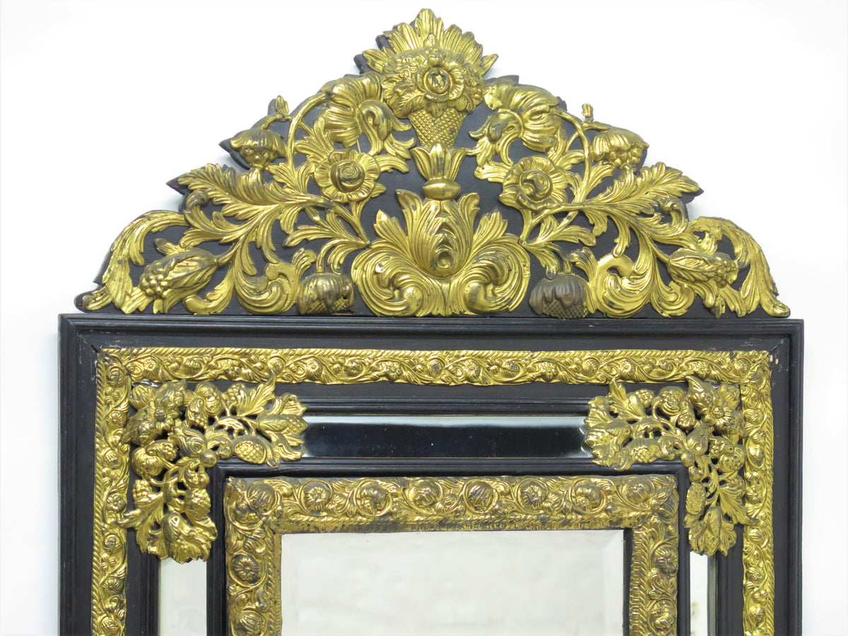 Dutch Looking Glass of Ebony and Brass Repoussé – Nick Brock Antiques